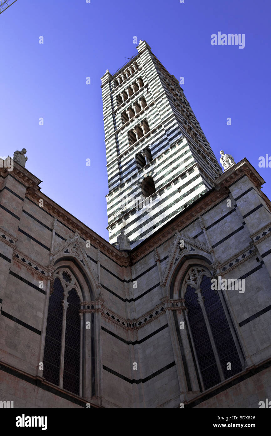 The striped marble bell tower of the Duomo (cathedral) seen from Piazza ...
