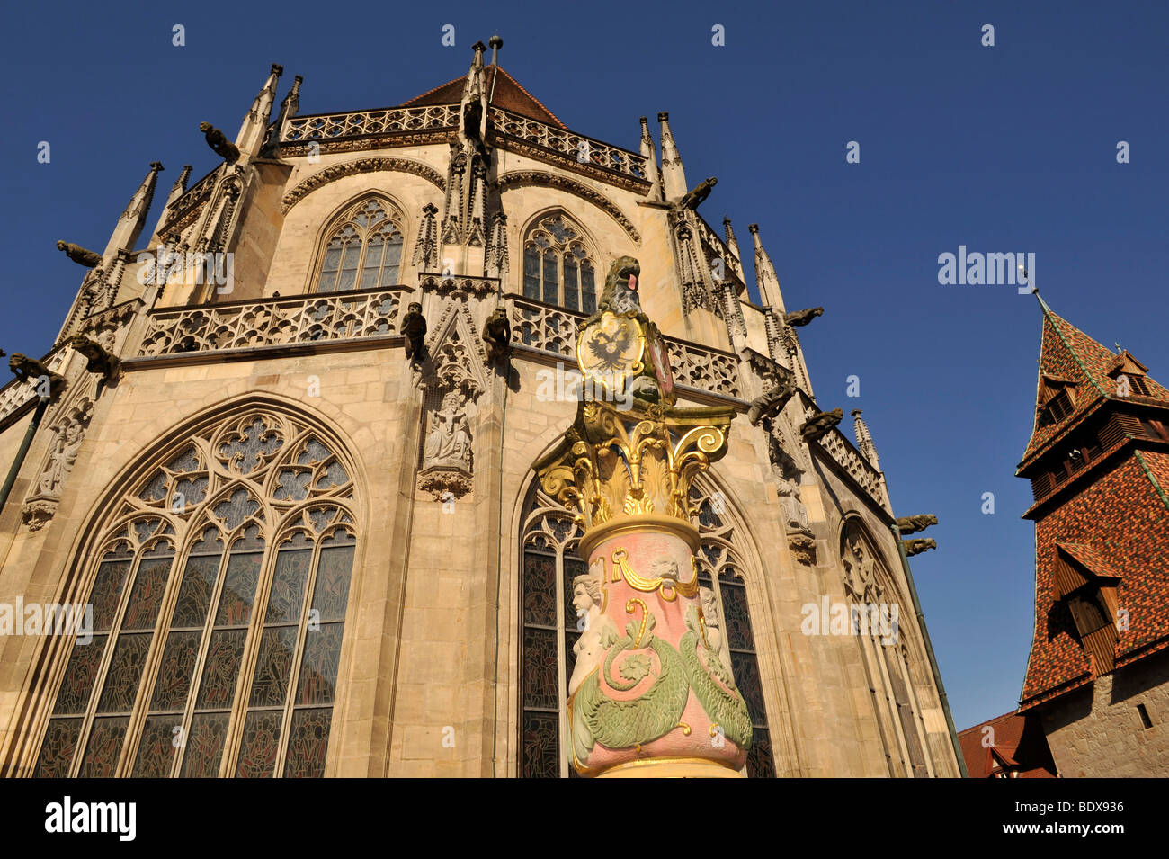 Loewenbrunnen Lion fountain, belfry and choir of the Heilig-Kreuz-Muenster Holy Cross cathedral ...