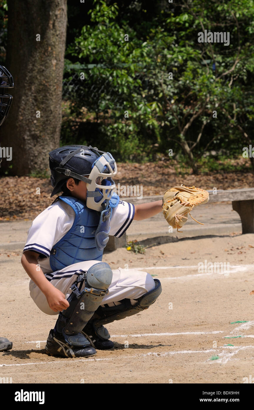 Child training for the national sport of baseball on the grounds of the ...