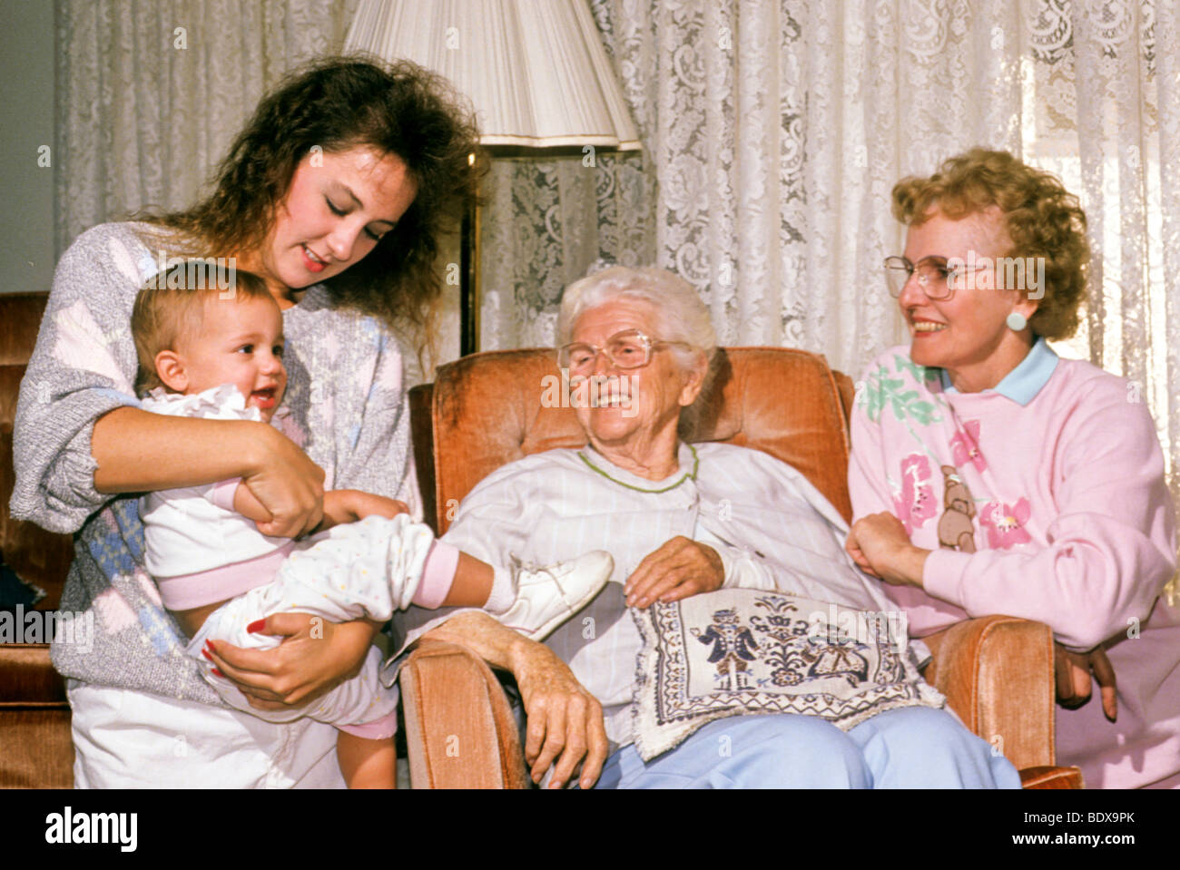 Four generations baby, mother, grandmother, great-grandmother female ...