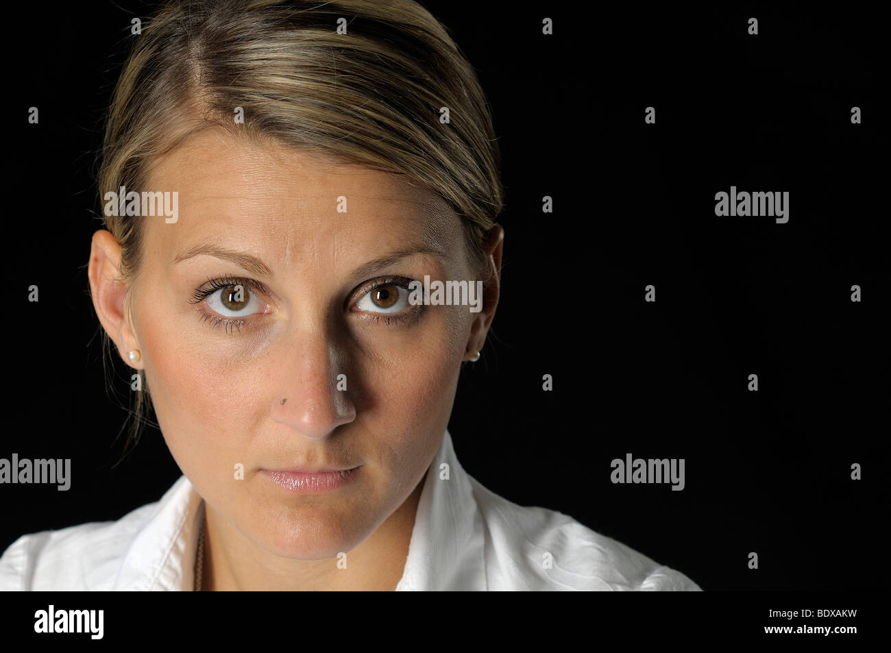 Woman's face, portrait, looking at the camera Stock Photo - Alamy