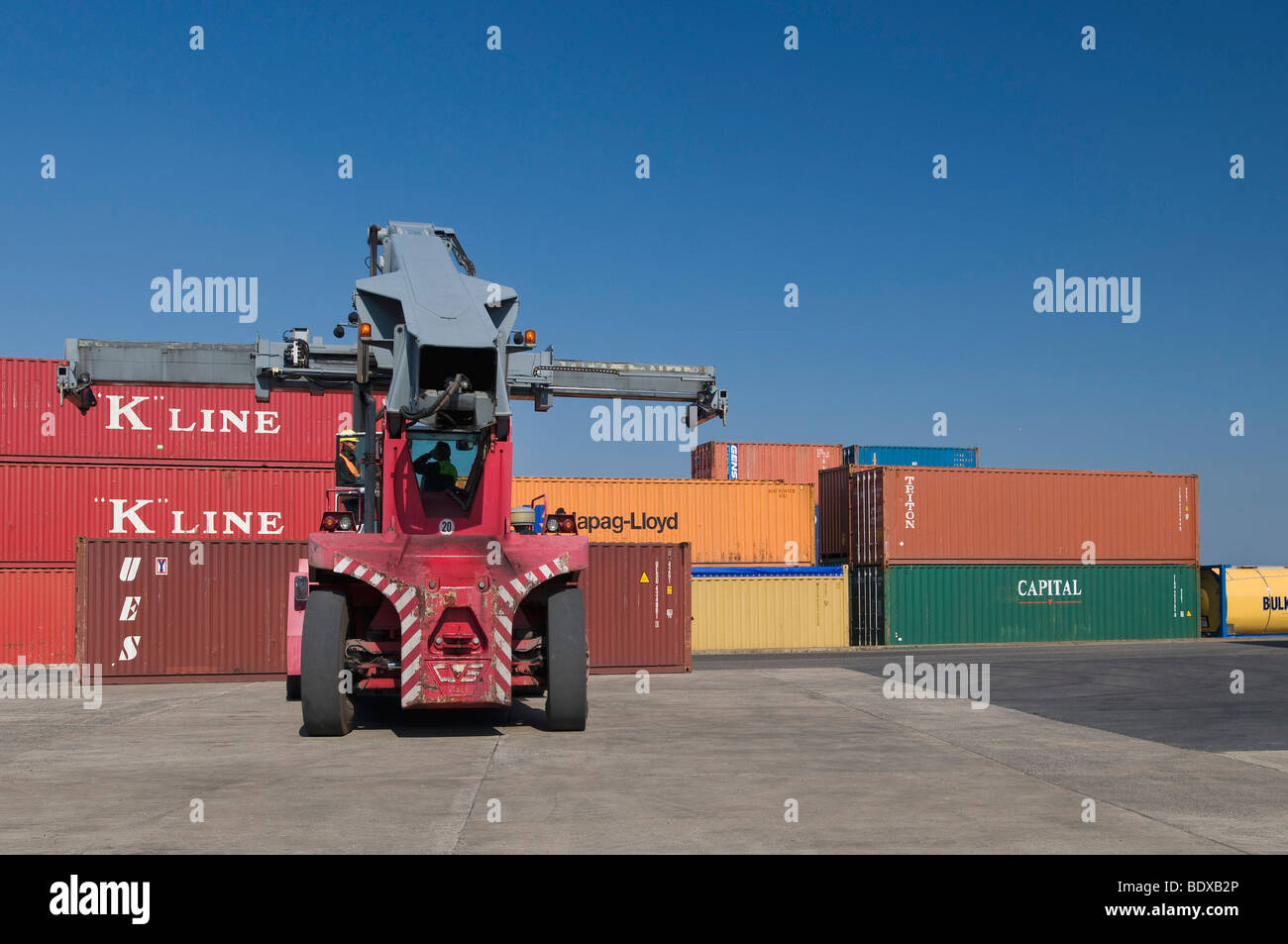 Container Terminal Bonn, reach stacker in front of ISO containers ...
