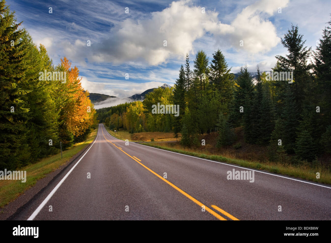 Autumn highway through Montana Stock Photo - Alamy