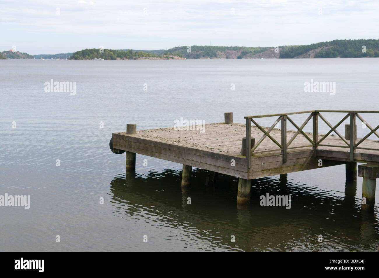 Wooden bridge in the sea Stock Photo - Alamy