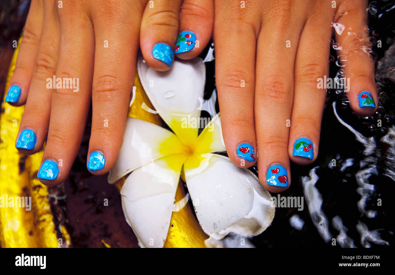 Newly polished finger nails with design Stock Photo - Alamy