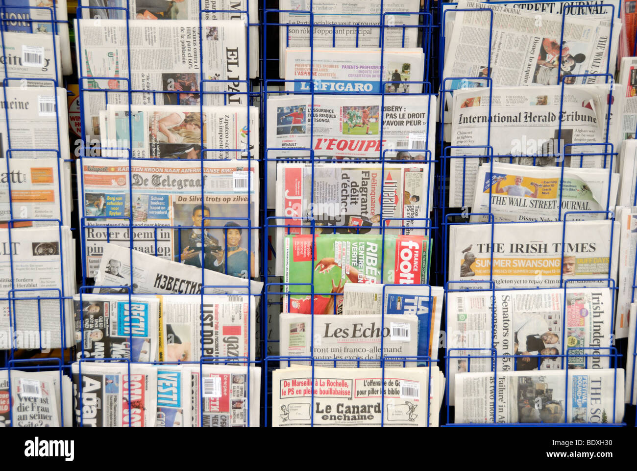 Foreign European newspapers on a stand outside London newsagent Stock ...