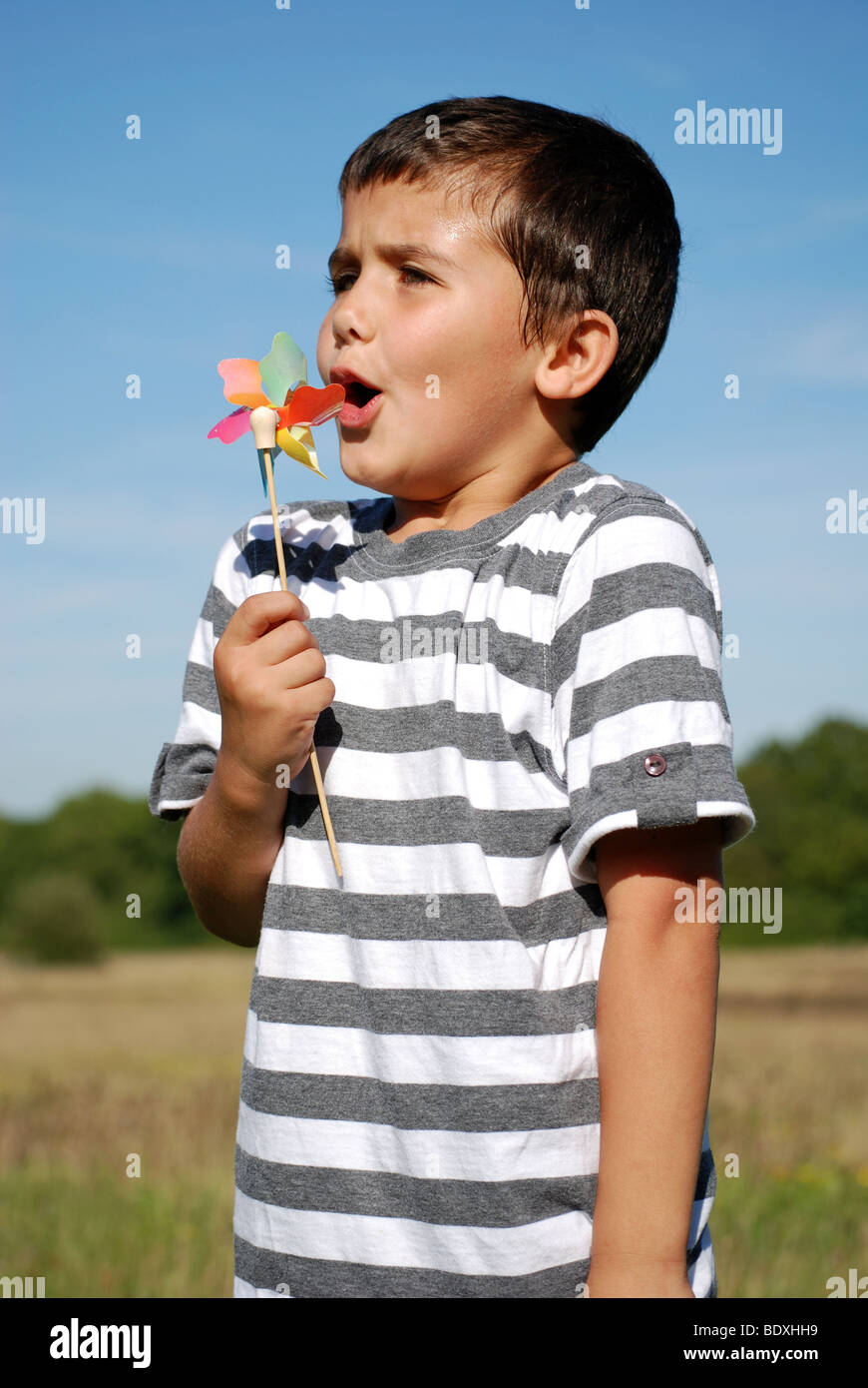 Portrait cute asian boy blowing hi-res stock photography and images - Alamy