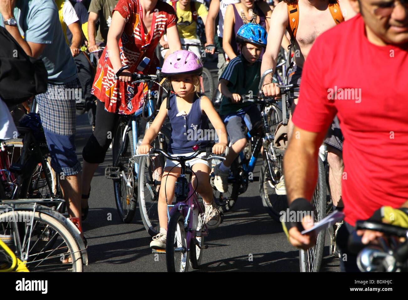 Children riding bikes in parade hi-res stock photography and images - Alamy