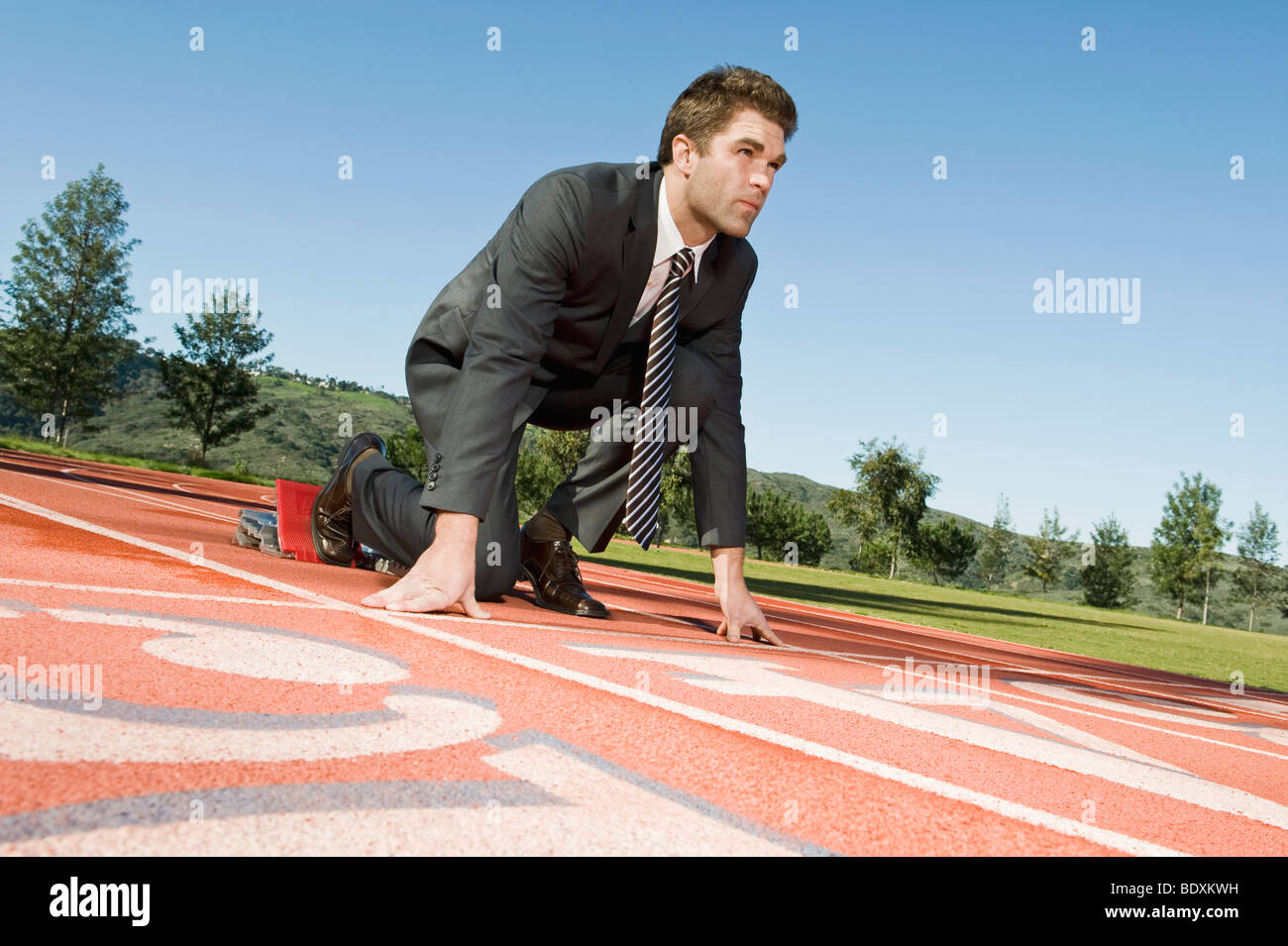 Businessman At Starting Blocks Stock Photo - Alamy