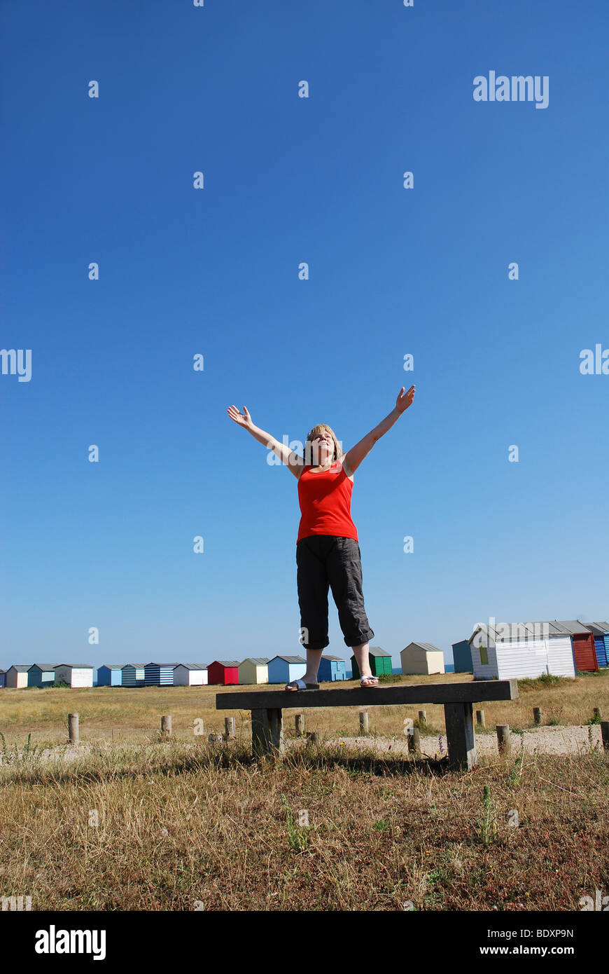 Elated woman outside hi-res stock photography and images - Alamy