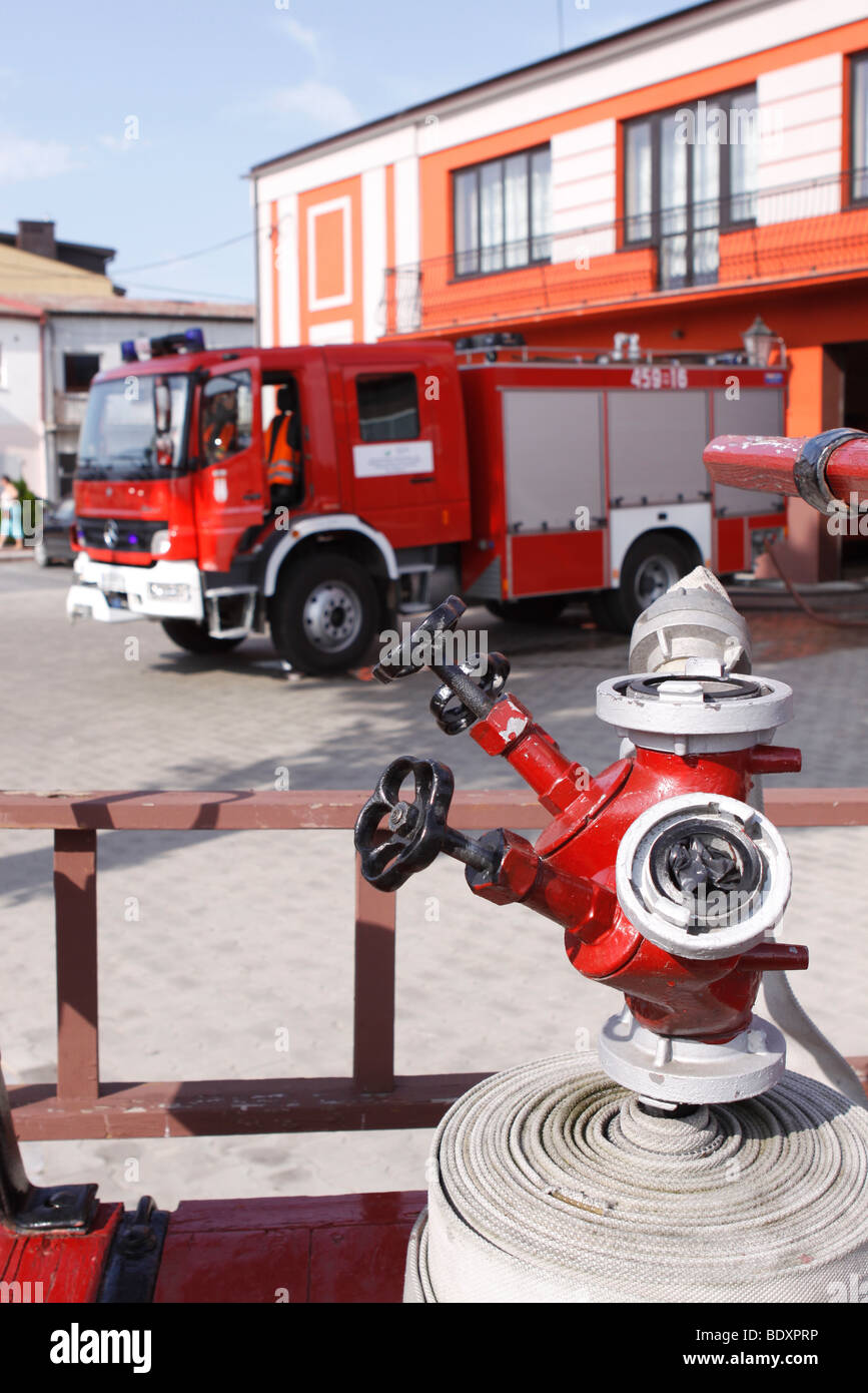 Fire station with fire engine hose hydrant and valves Stock Photo - Alamy