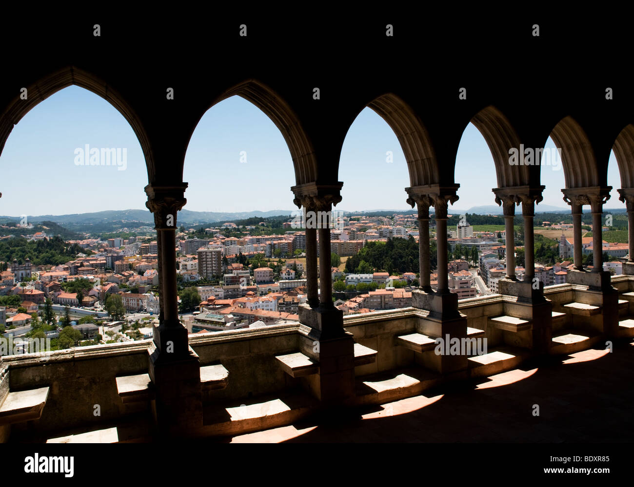 The town of Leira, in central Portugal, as seen through the arches of ...
