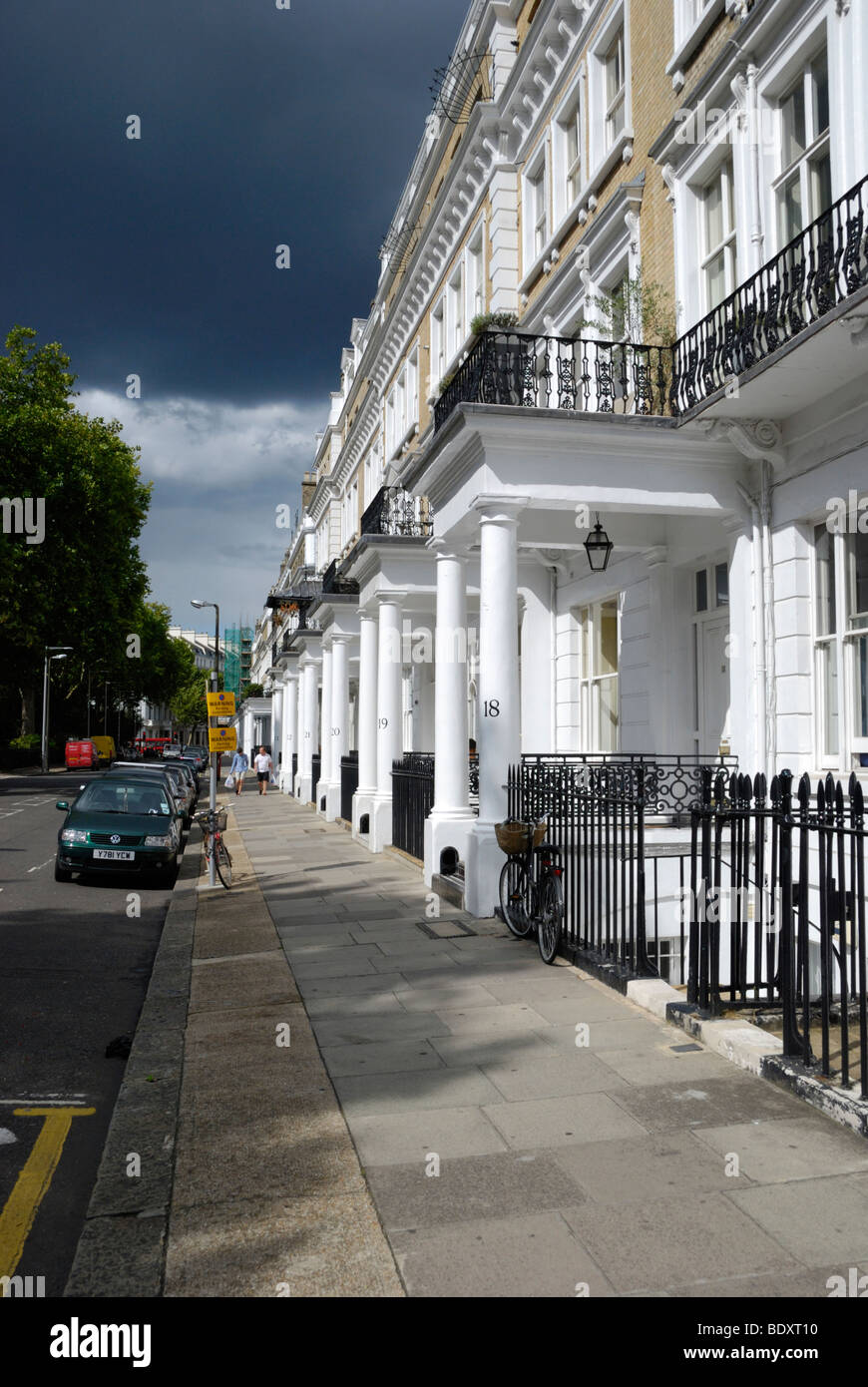 White terraced houses in Onslow Gardens, Chelsea, London, England, UK ...