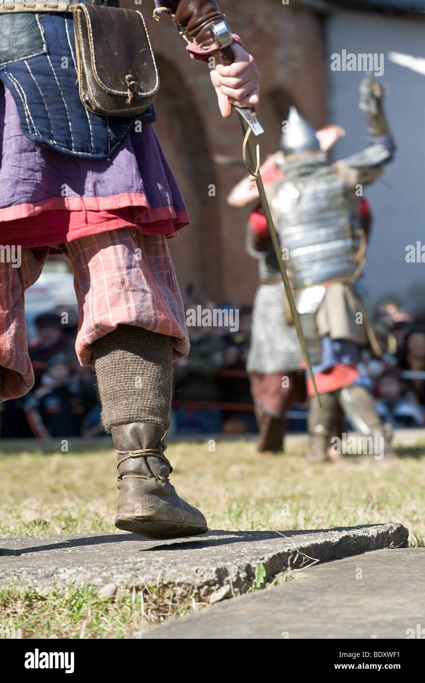 hand with sword closeup as detail of fighting Stock Photo - Alamy