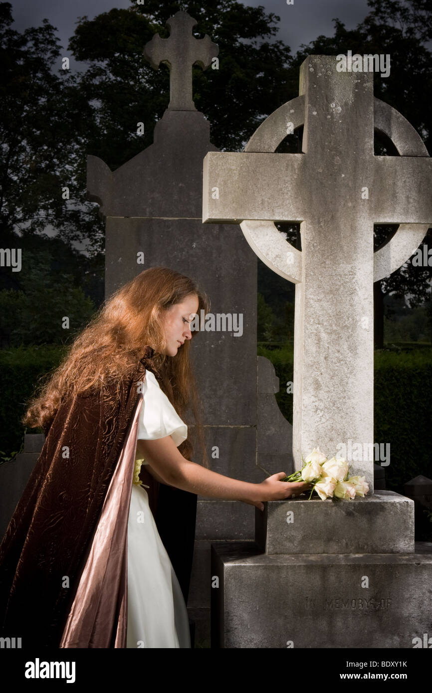Mourning grave widow hi-res stock photography and images - Alamy