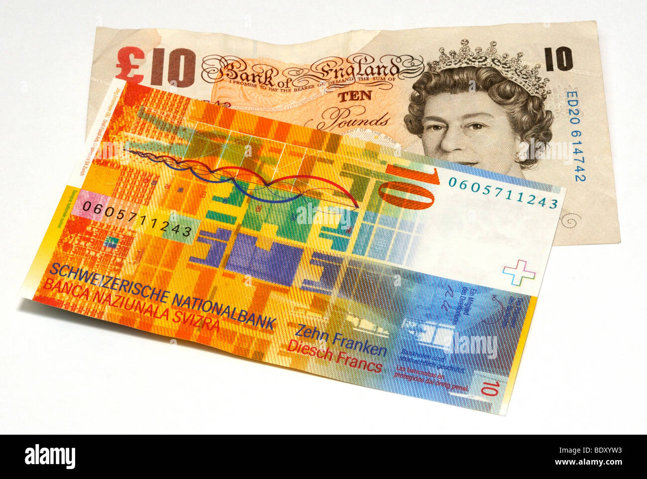 UK Ten Pound Note and Swiss Ten Franc Bank Note Stock Photo - Alamy