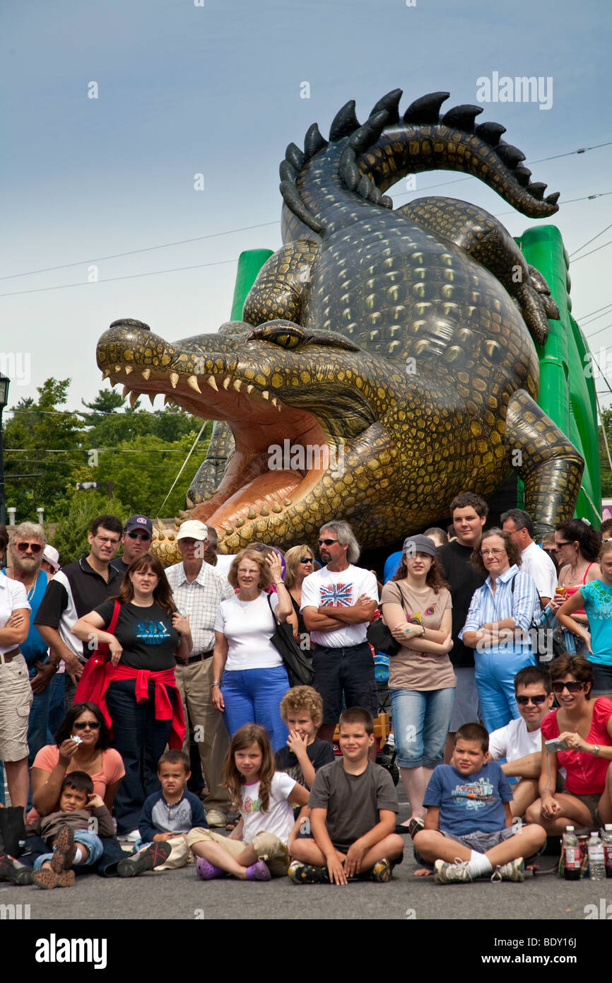 Fake Alligator, scaring crowds at a local street parade Stock Photo - Alamy