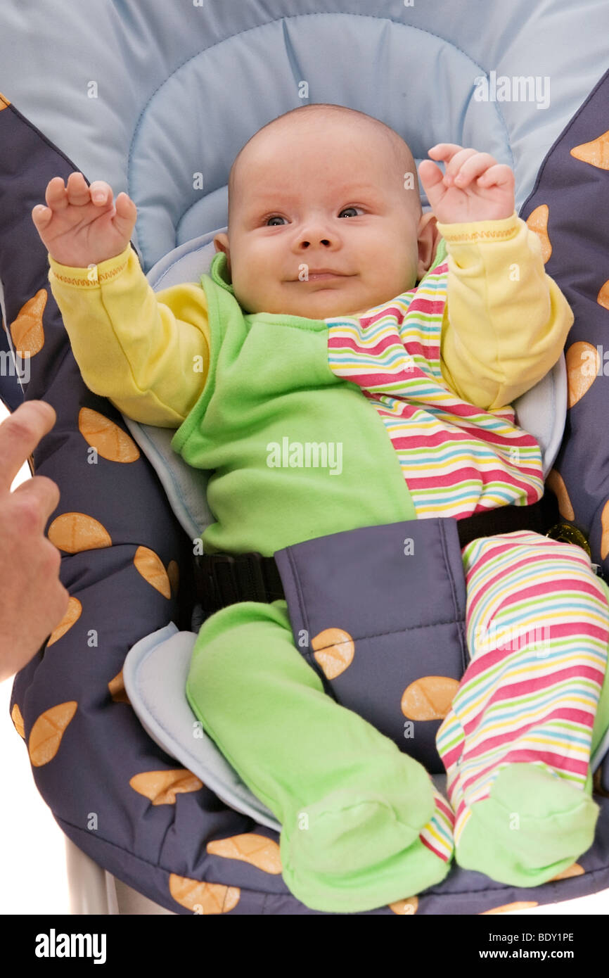 happy smiling baby in car child armchair, closeup Stock Photo - Alamy