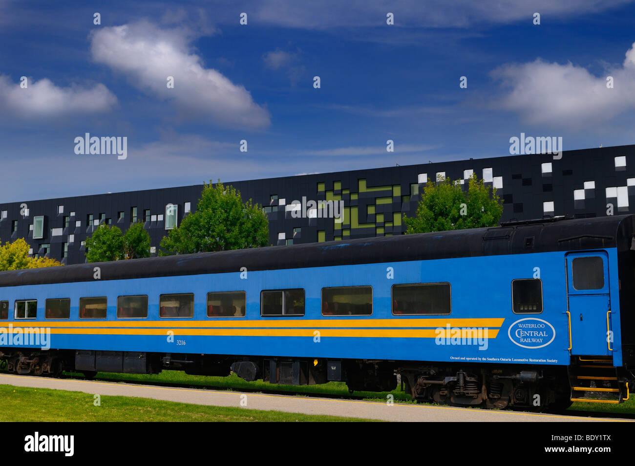 Blue historic Waterloo Central Railway train car with modern Perimeter ...