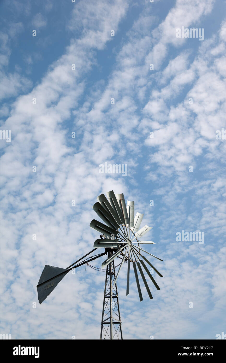 Wind pump with sky background Stock Photo - Alamy