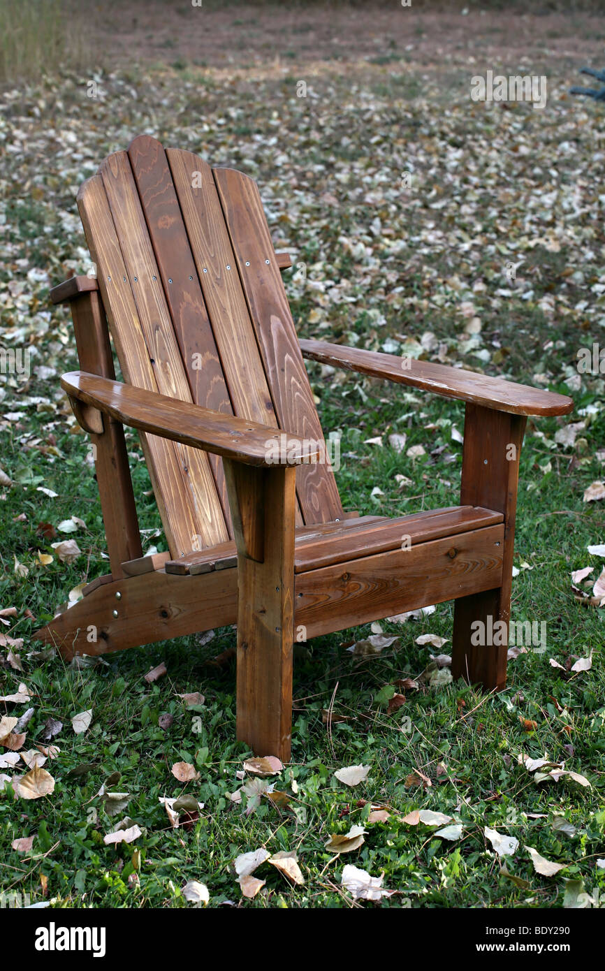 Adirondack Wooden Chair, Autumn setting Stock Photo - Alamy