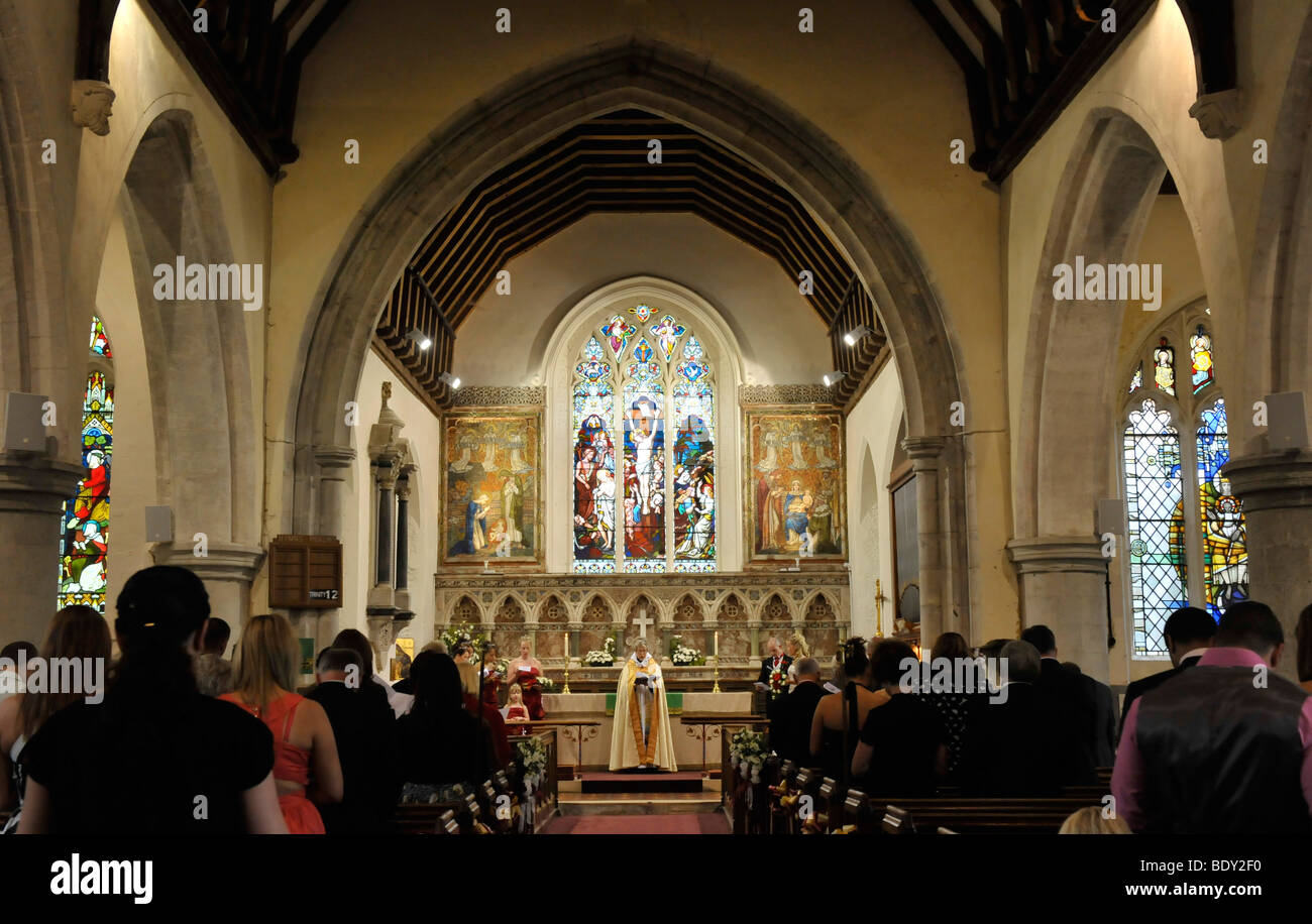 scene inside a church during a wedding Stock Photo - Alamy
