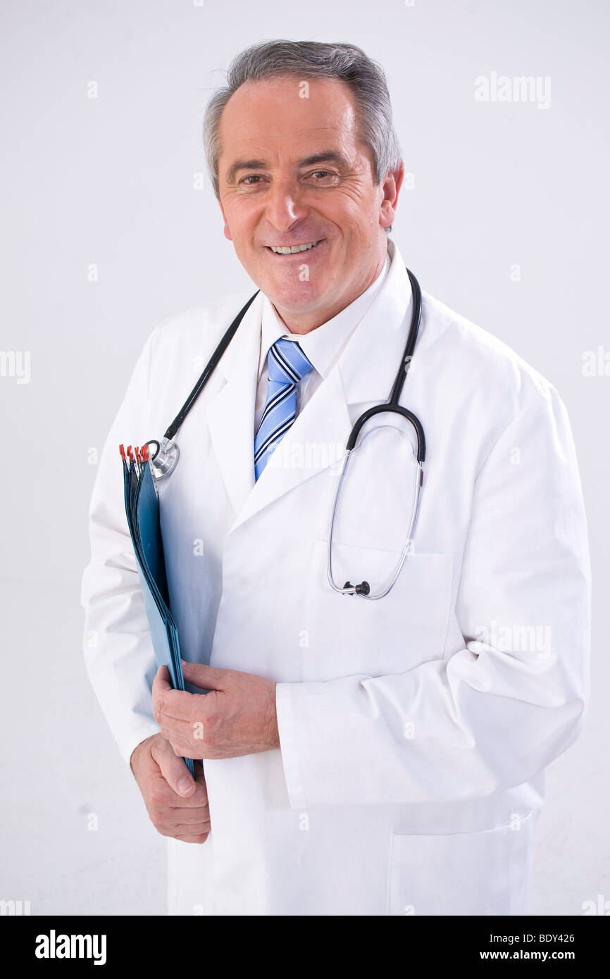 Smiling physician with stethoscope and medical records Stock Photo - Alamy