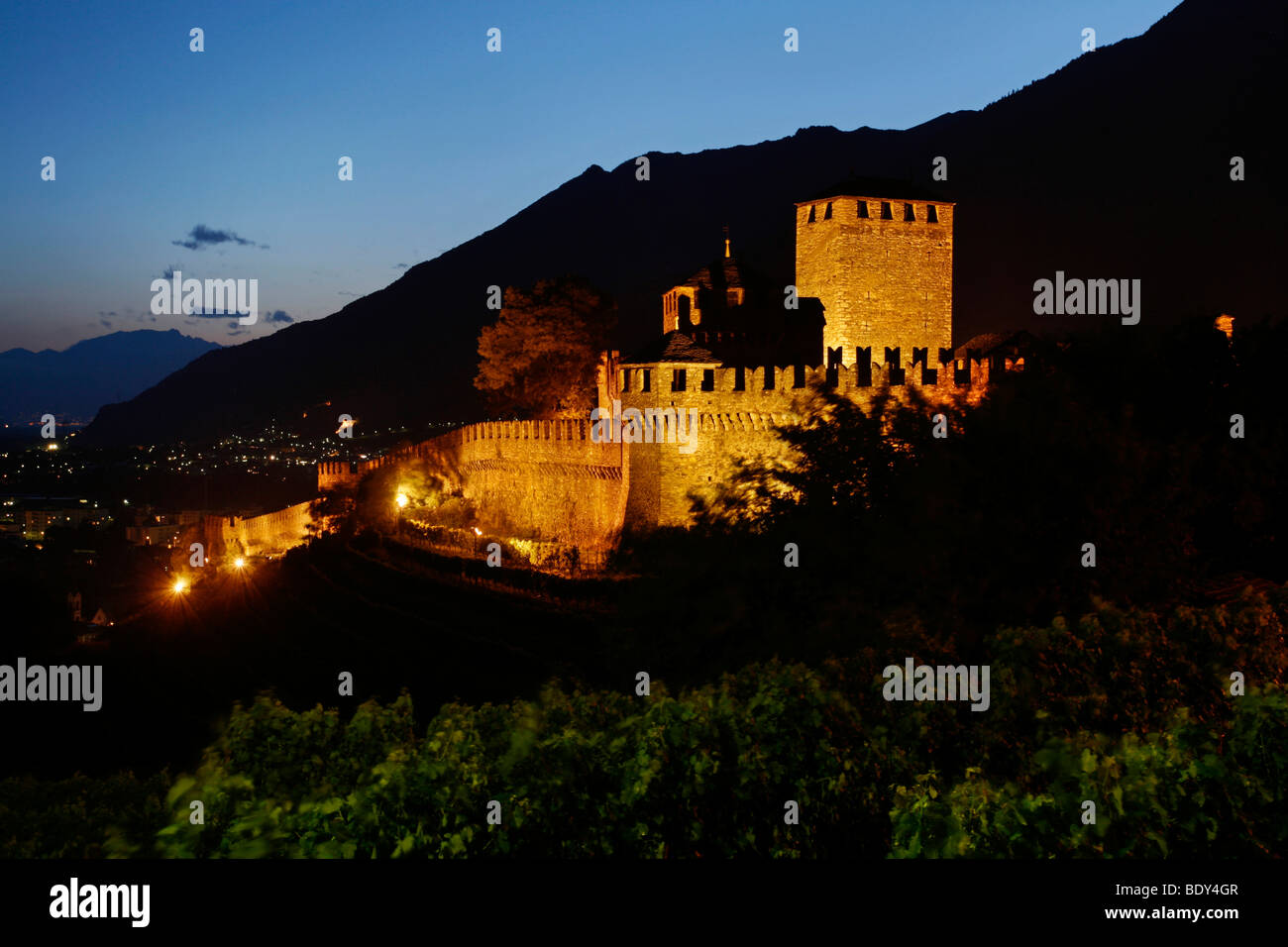 Unesco World Heritage Castles of Bellinzona, Montebello Castle at dusk ...