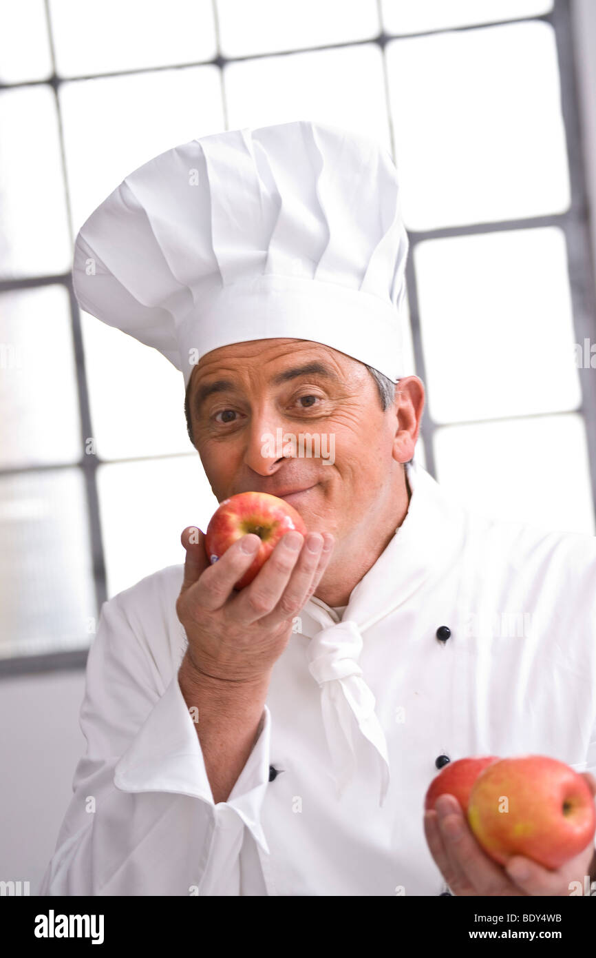 Chefs wearing hats hi-res stock photography and images - Alamy