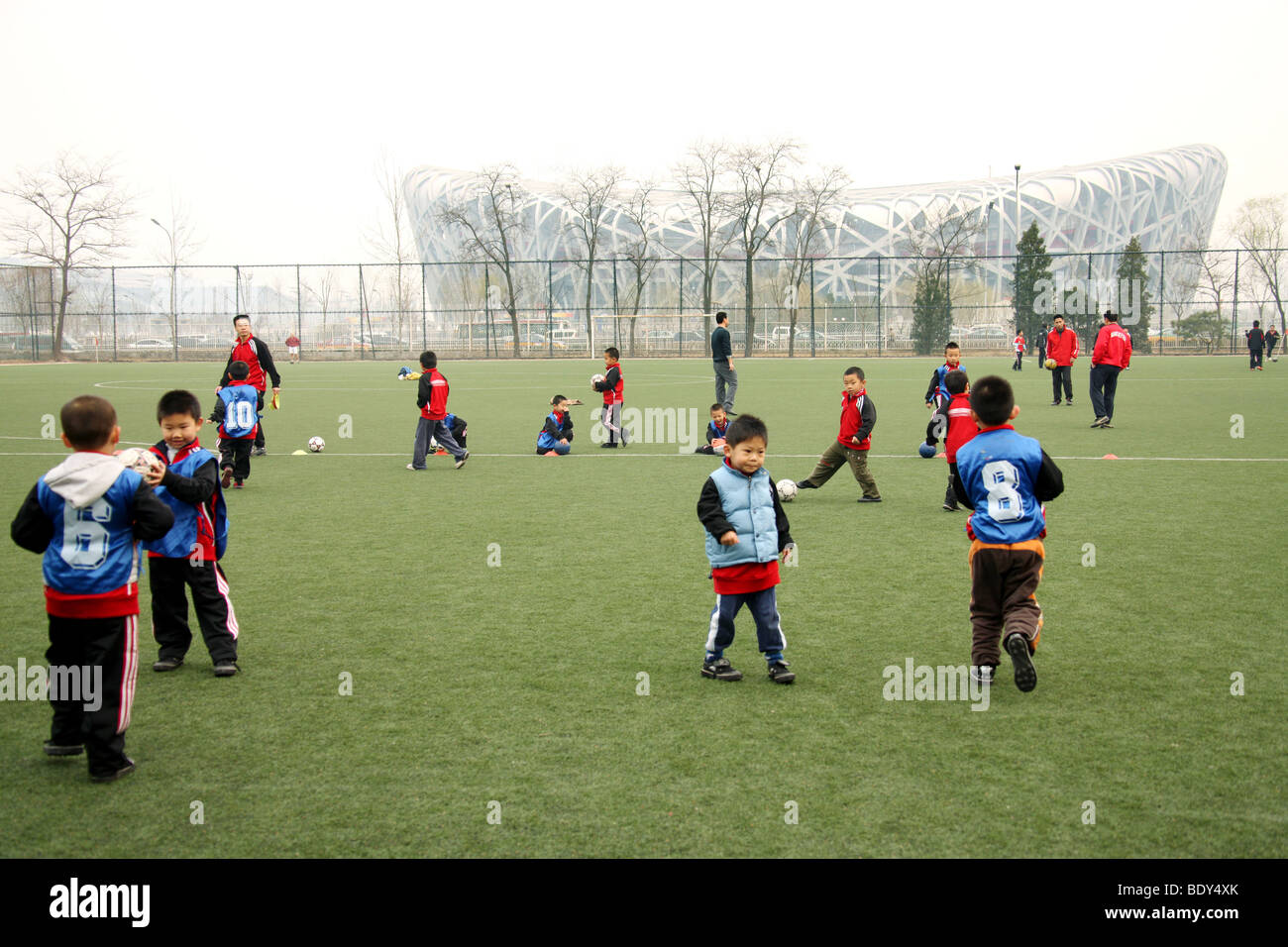 Chinese children playing football hi-res stock photography and images ...