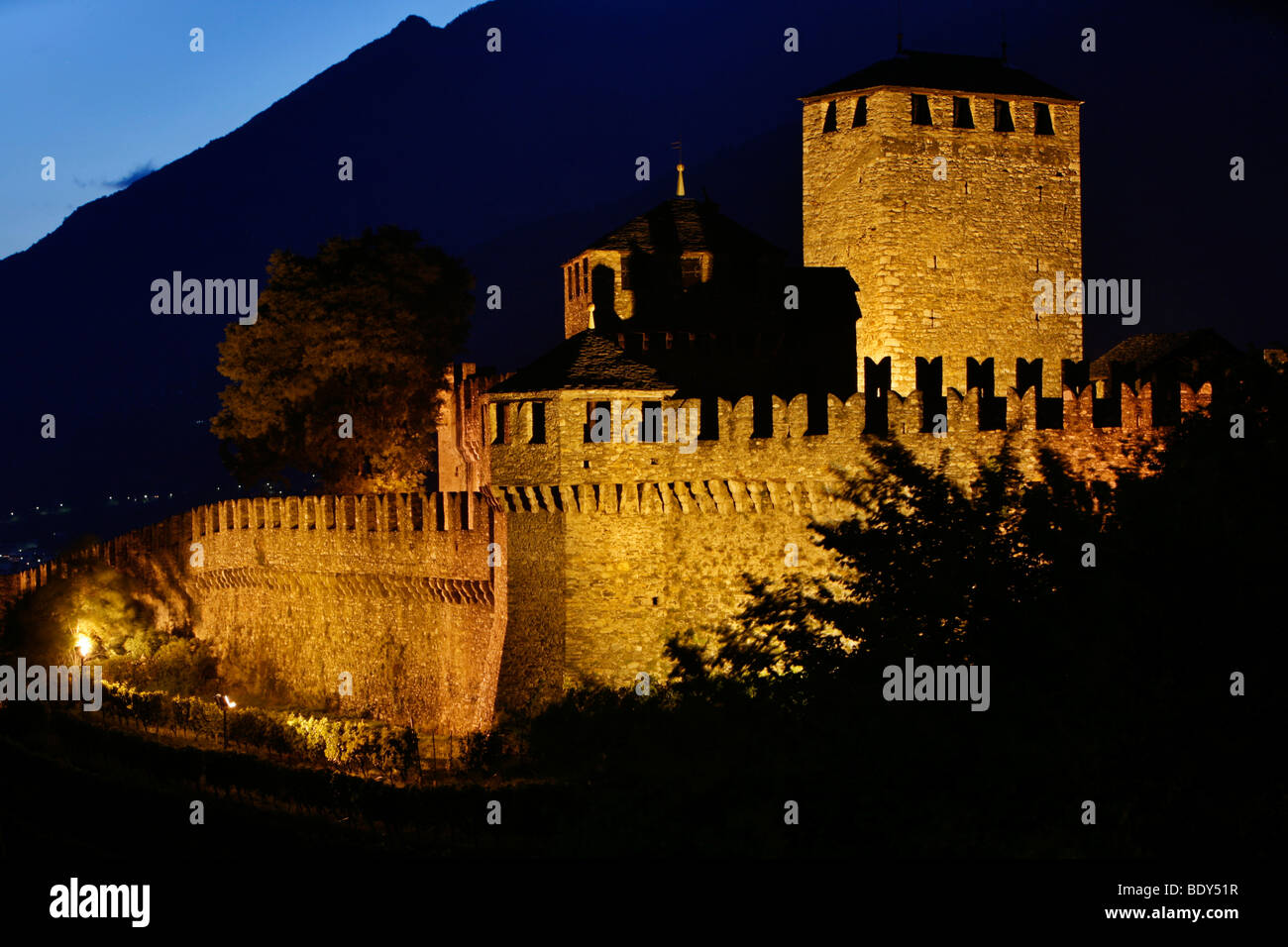 Unesco World Heritage Castles of Bellinzona, Montebello Castle at dusk ...