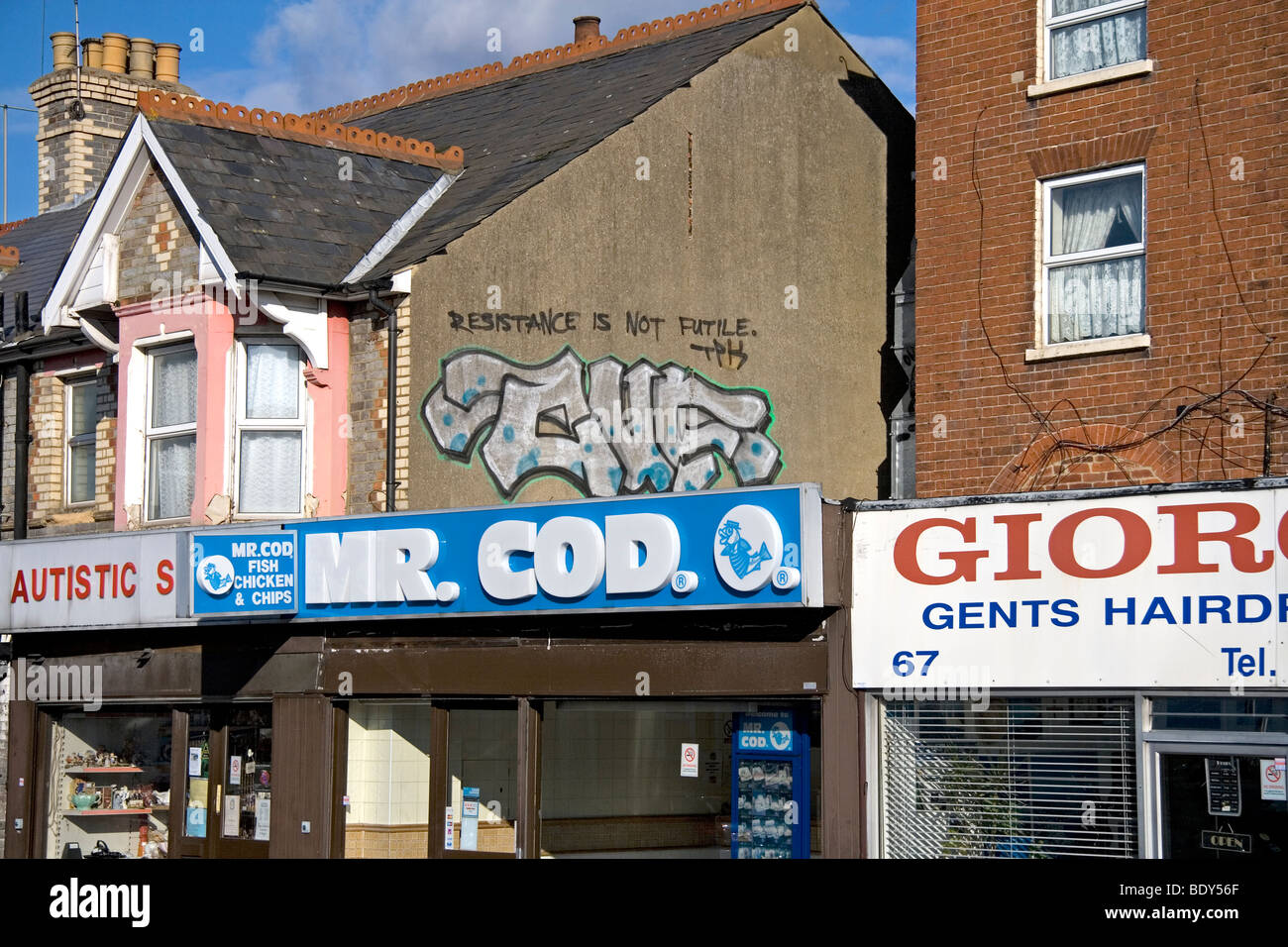Graffiti above shops in Reading Stock Photo - Alamy