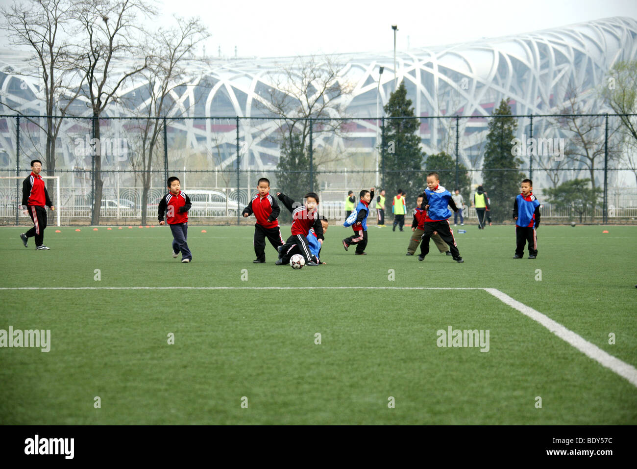 Chinese children playing football hi-res stock photography and images ...