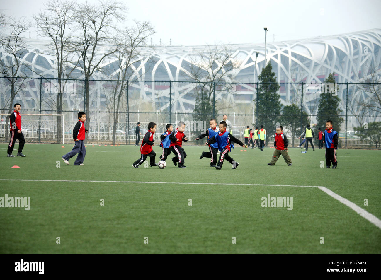Chinese children playing football hi-res stock photography and images ...