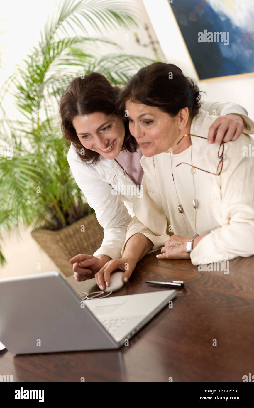 Child and adult working together hi-res stock photography and images ...