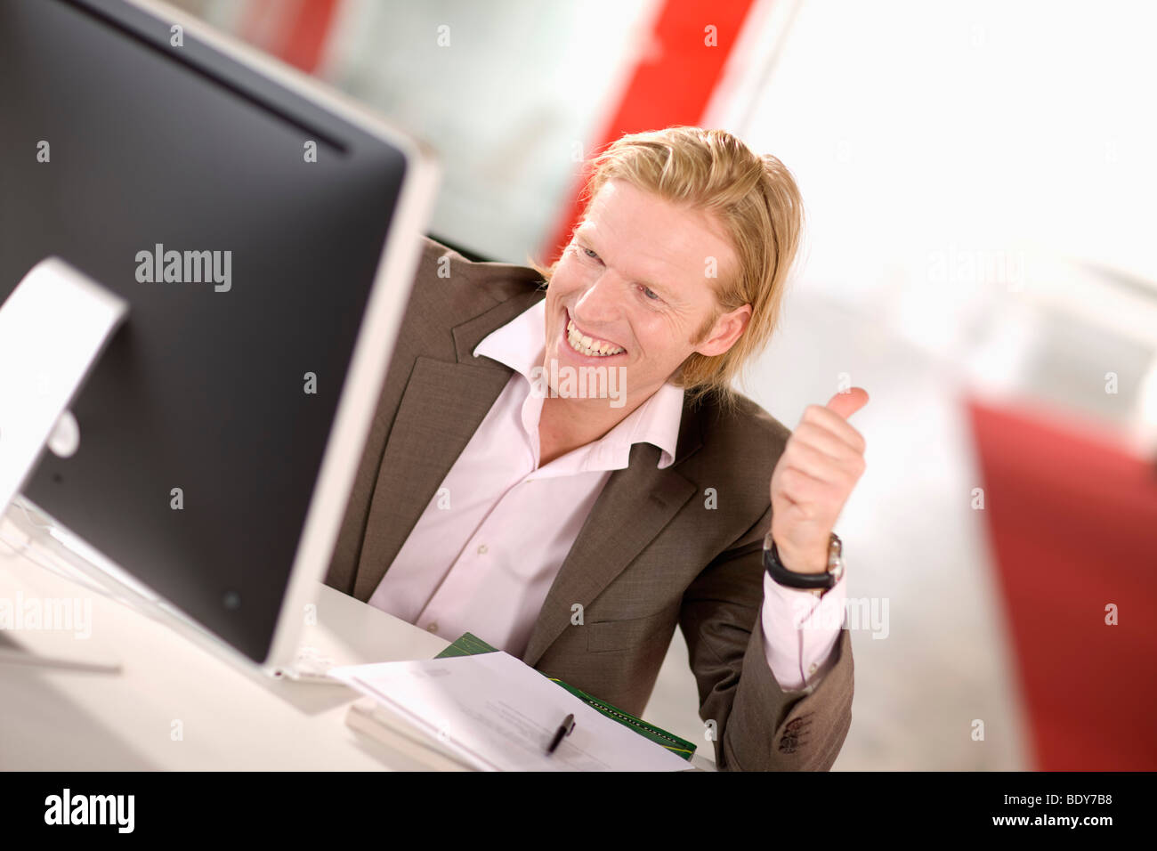 man working in an office Stock Photo - Alamy