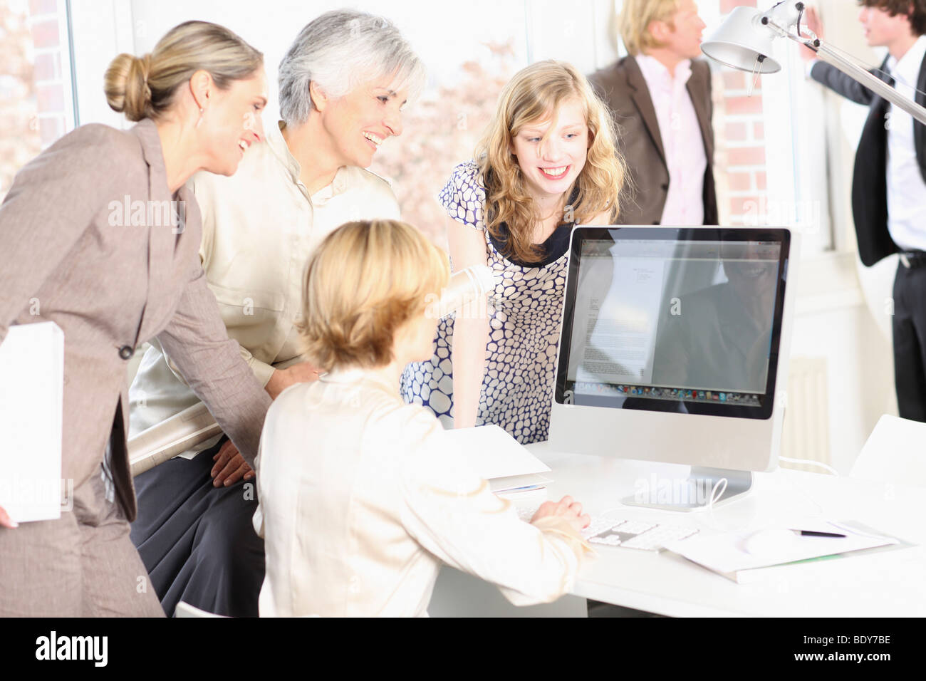 women are working in a office Stock Photo - Alamy