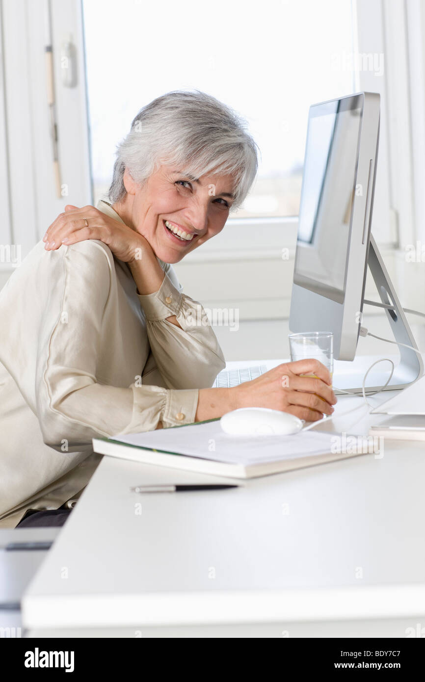 Toiling in the office hi-res stock photography and images - Alamy