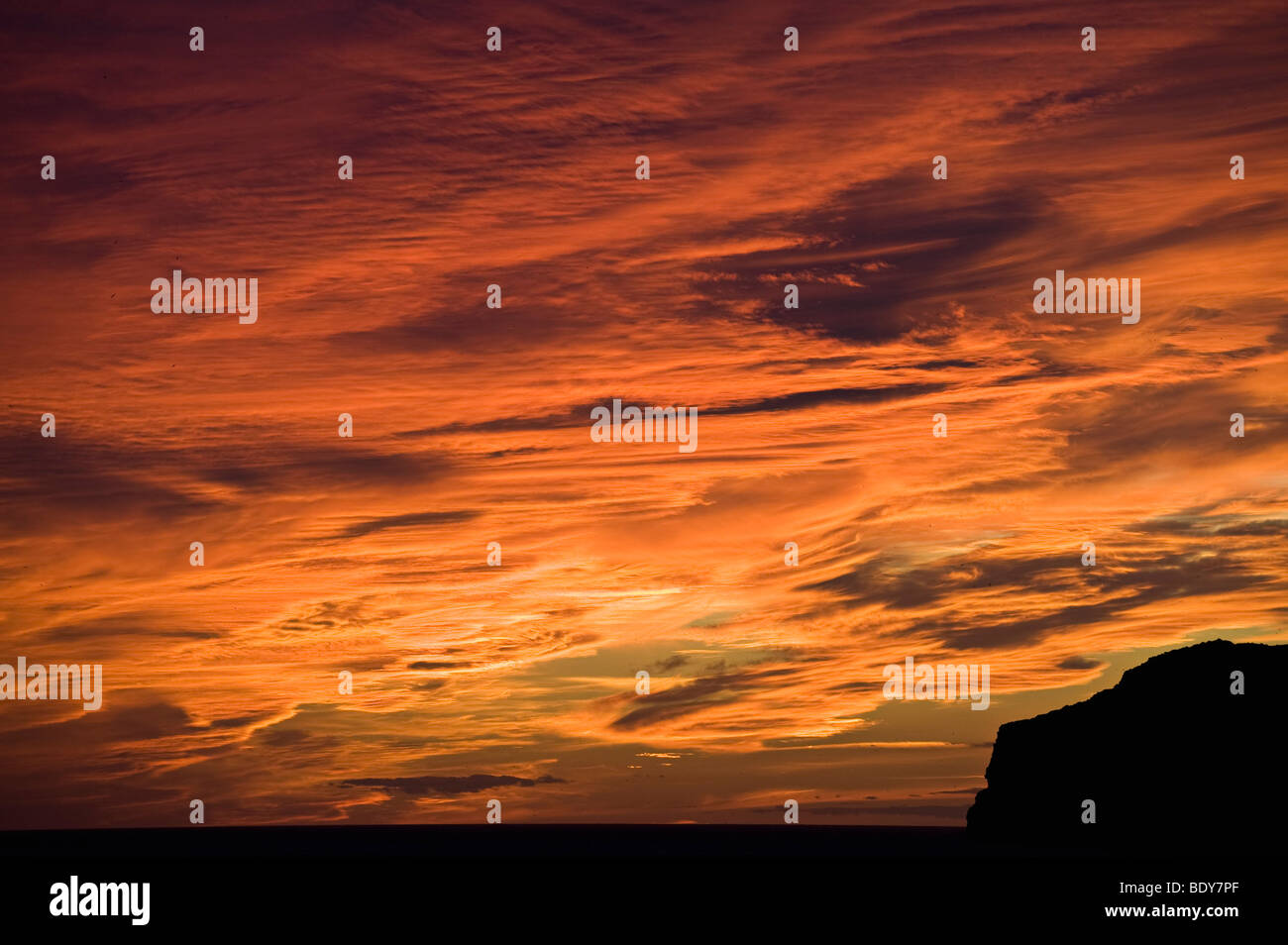 A red sky at sunset Stock Photo - Alamy
