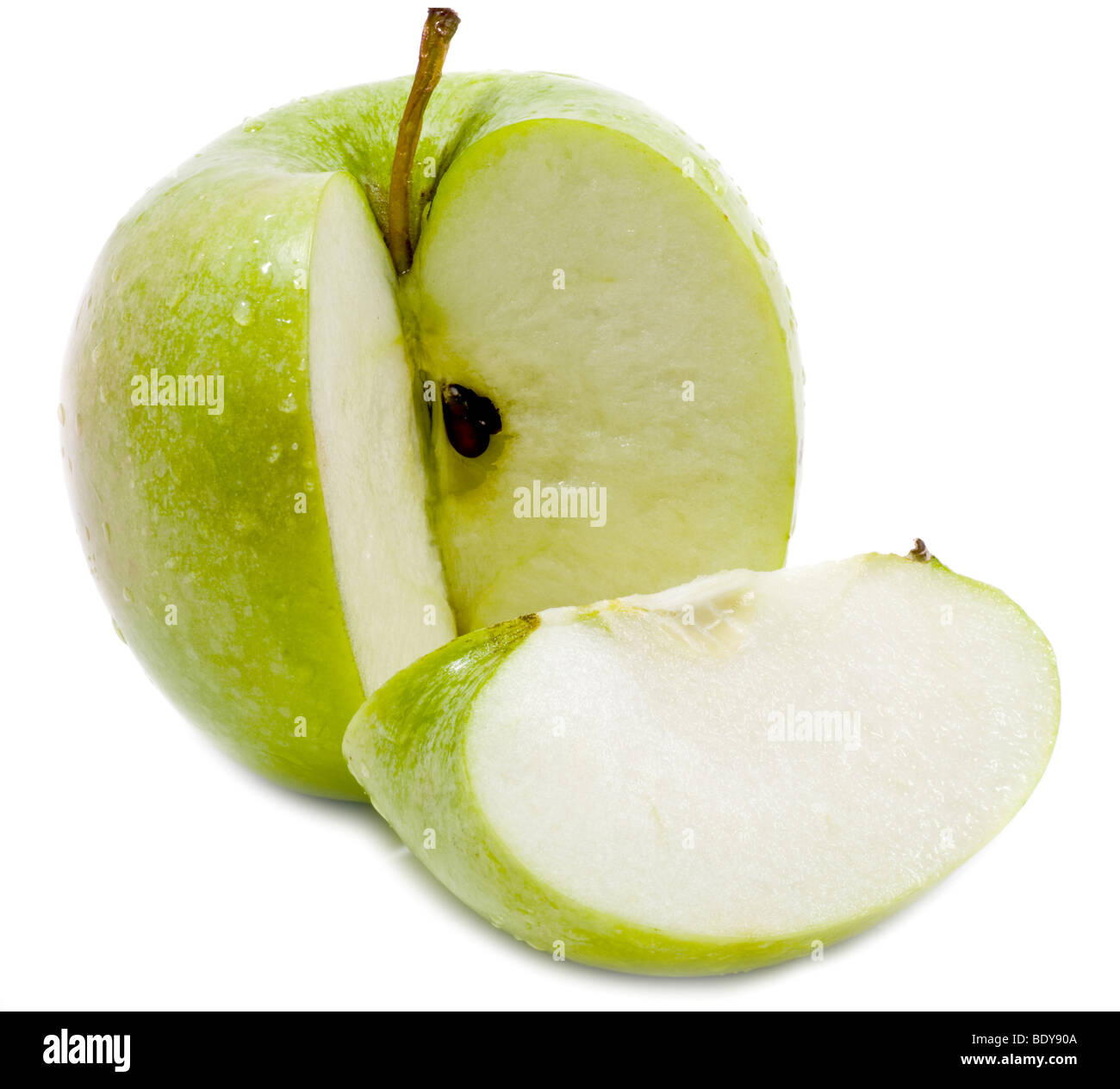 Green apple whole and cut on white background Stock Photo - Alamy