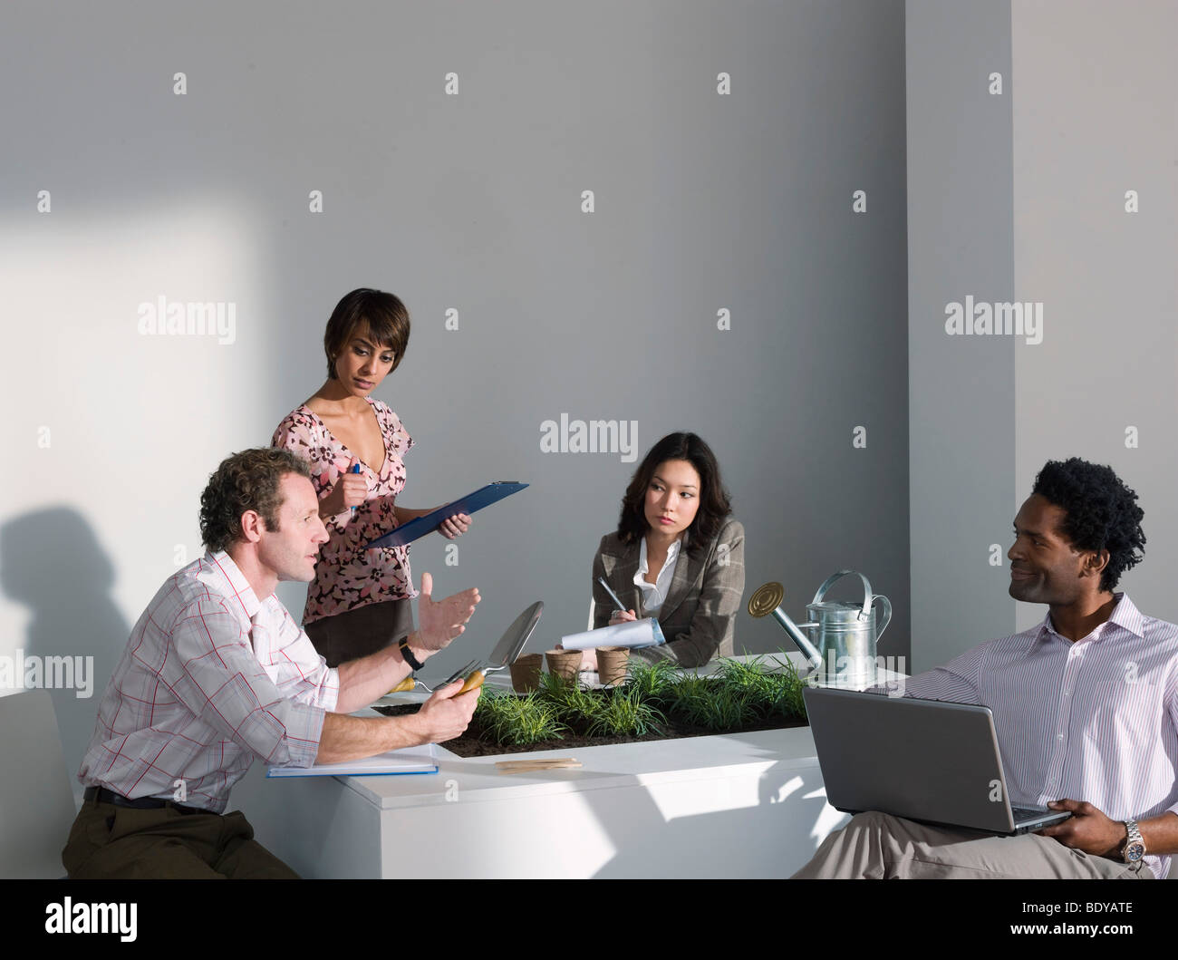 A business meeting on a green theme Stock Photo - Alamy