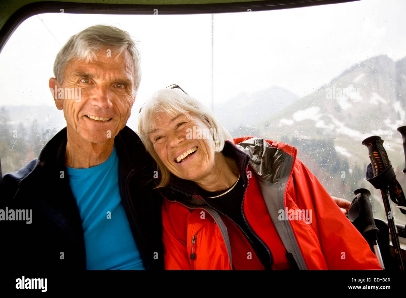 senior couple in mountain cable car Stock Photo - Alamy