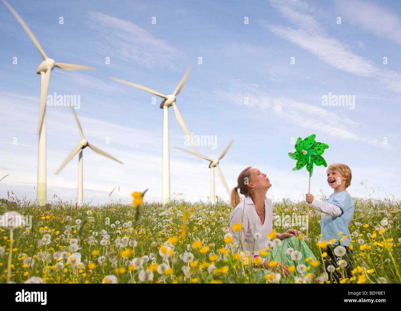 mother and son at wind turbine Stock Photo - Alamy