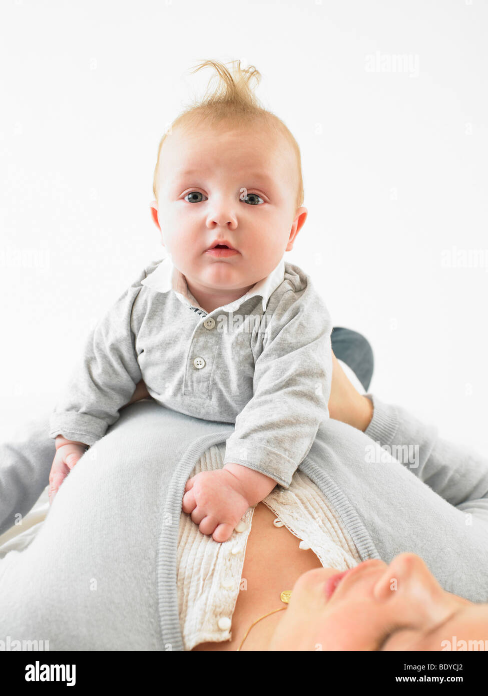 Baby on mother's chest Stock Photo - Alamy