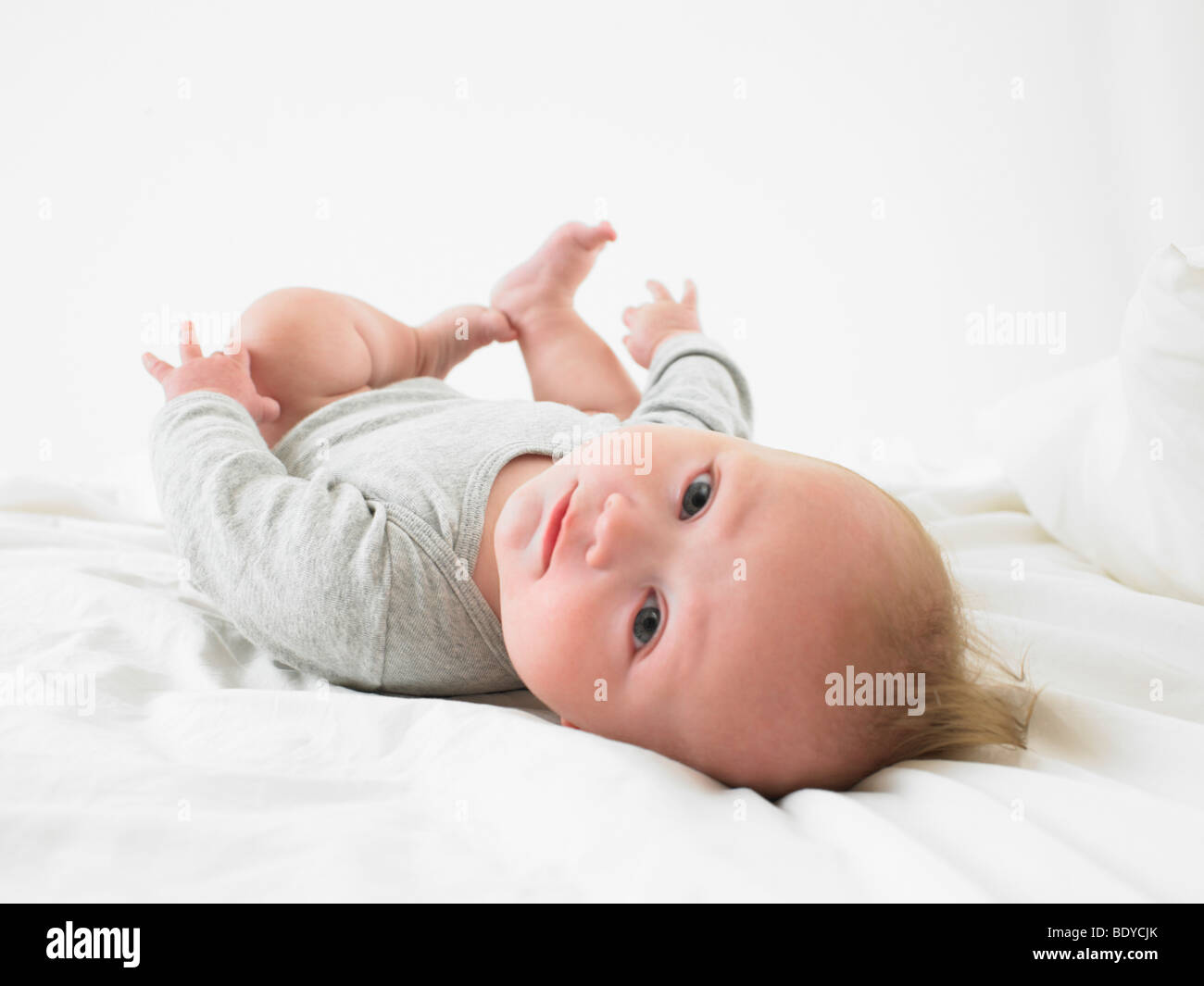 baby on back Stock Photo - Alamy