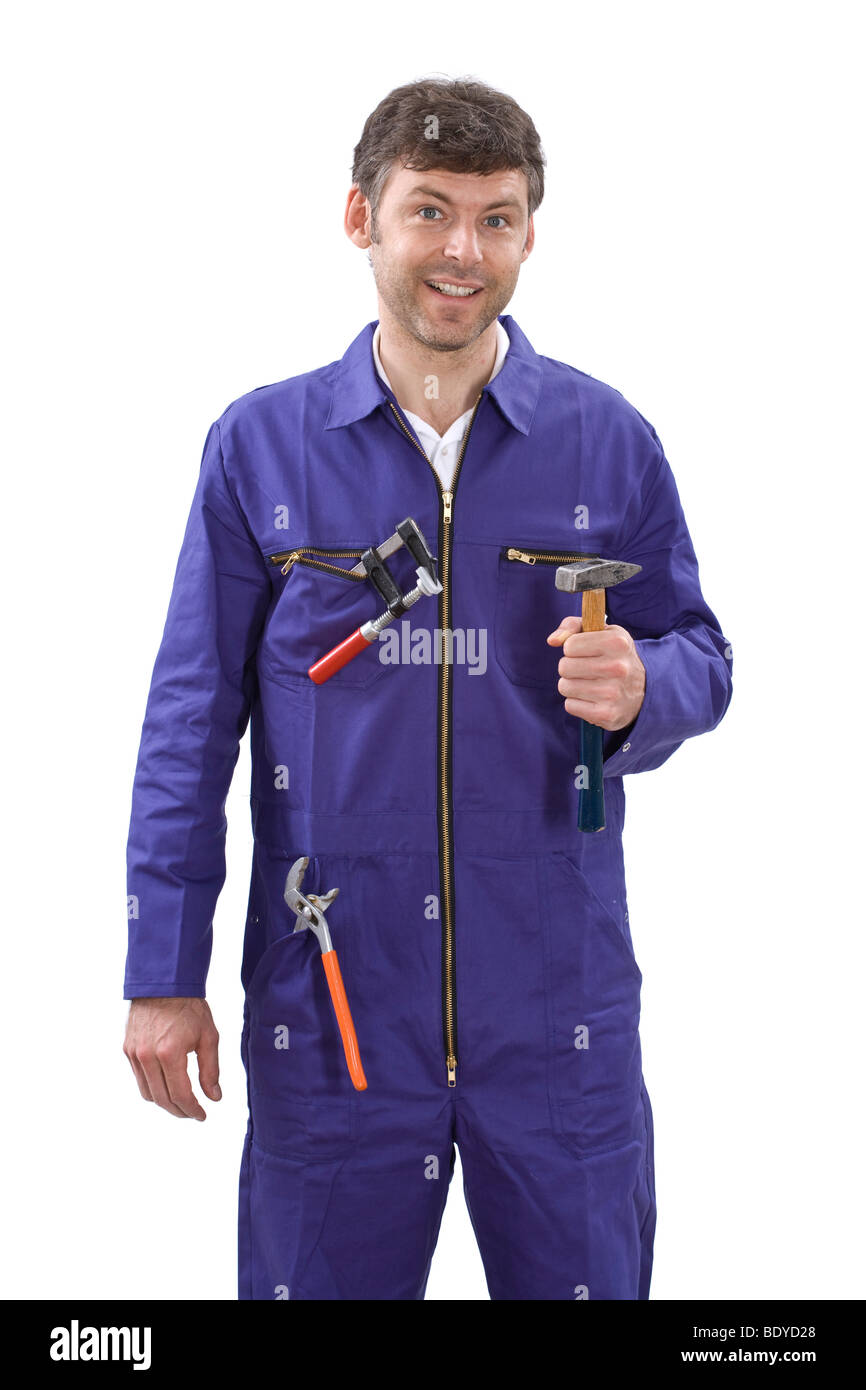 Workman with tool wearing a boiler suit Stock Photo - Alamy