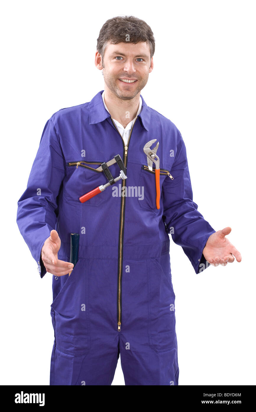 Workman with tool wearing a boiler suit Stock Photo - Alamy