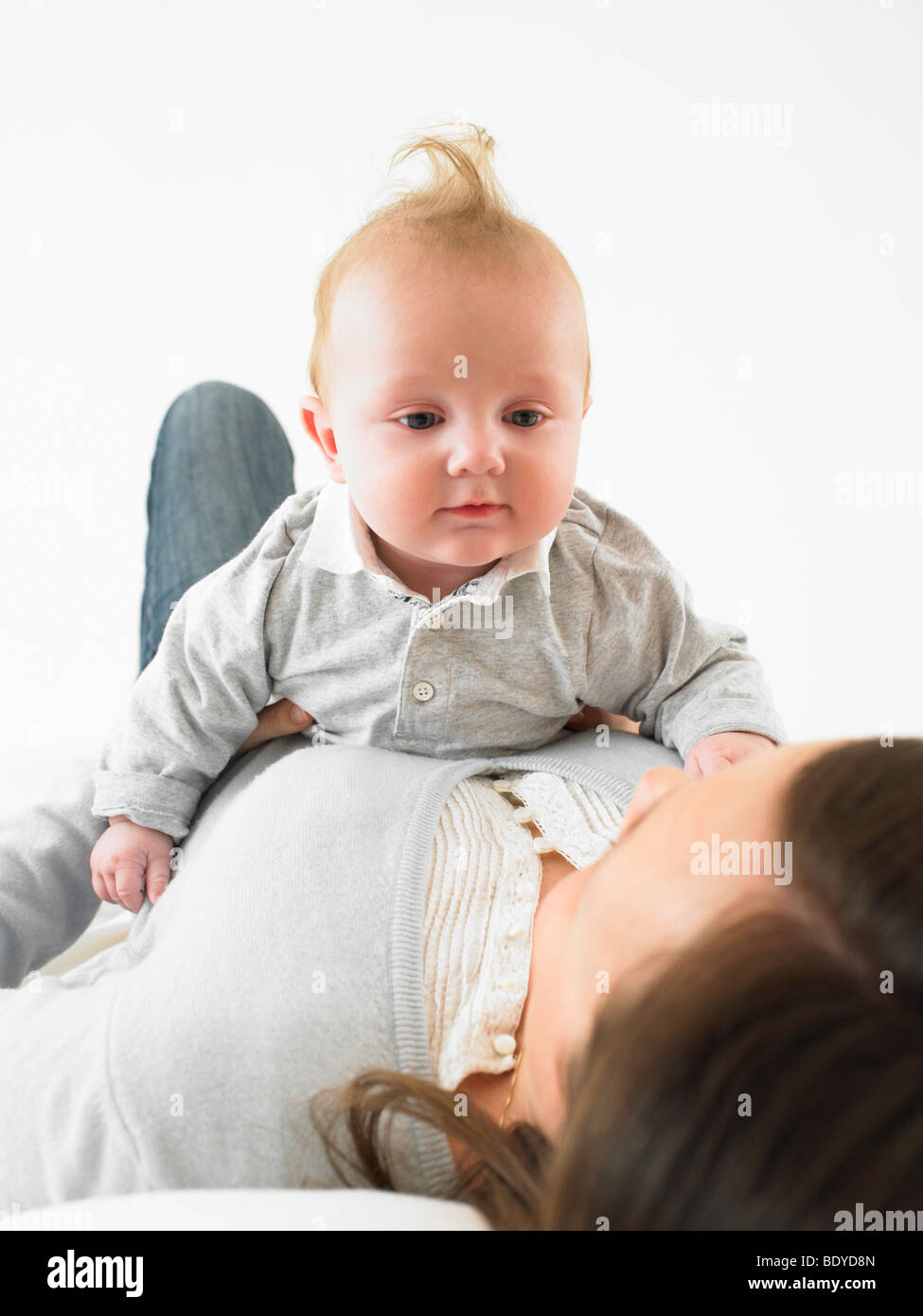 Baby on mother's chest Stock Photo - Alamy