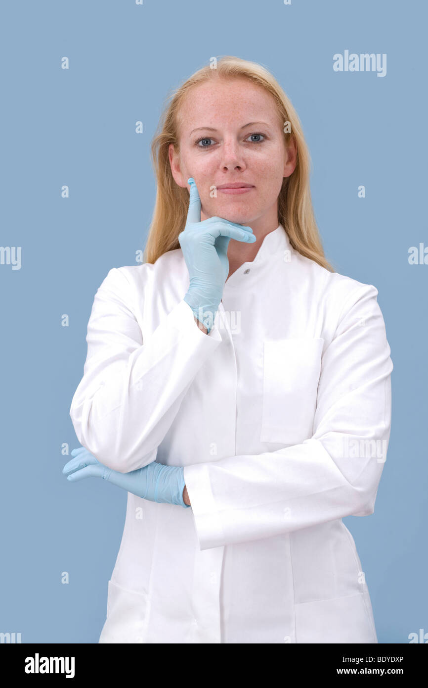 Lab assistant in a white lab coat Stock Photo - Alamy