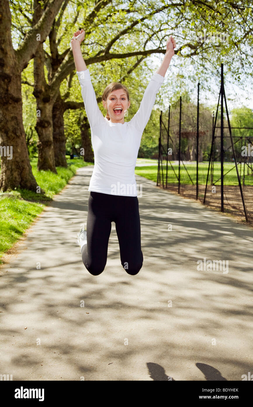 Portrait of a young woman jumping hi-res stock photography and images ...
